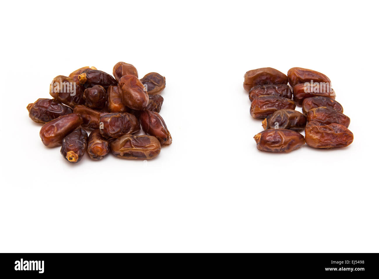 Halawi dates isolated on a white background. Halawi dates originate ...