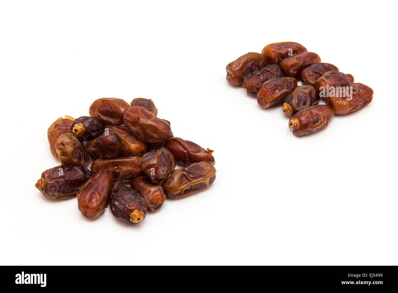 Halawi dates isolated on a white background. Halawi dates originate ...