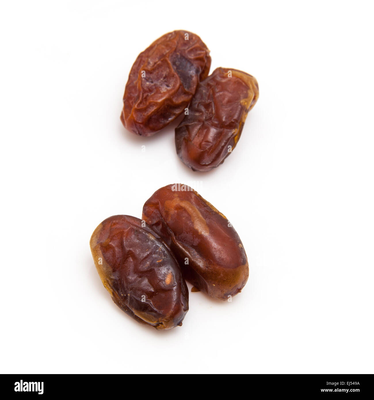 Halawi dates isolated on a white background. Halawi dates originate ...