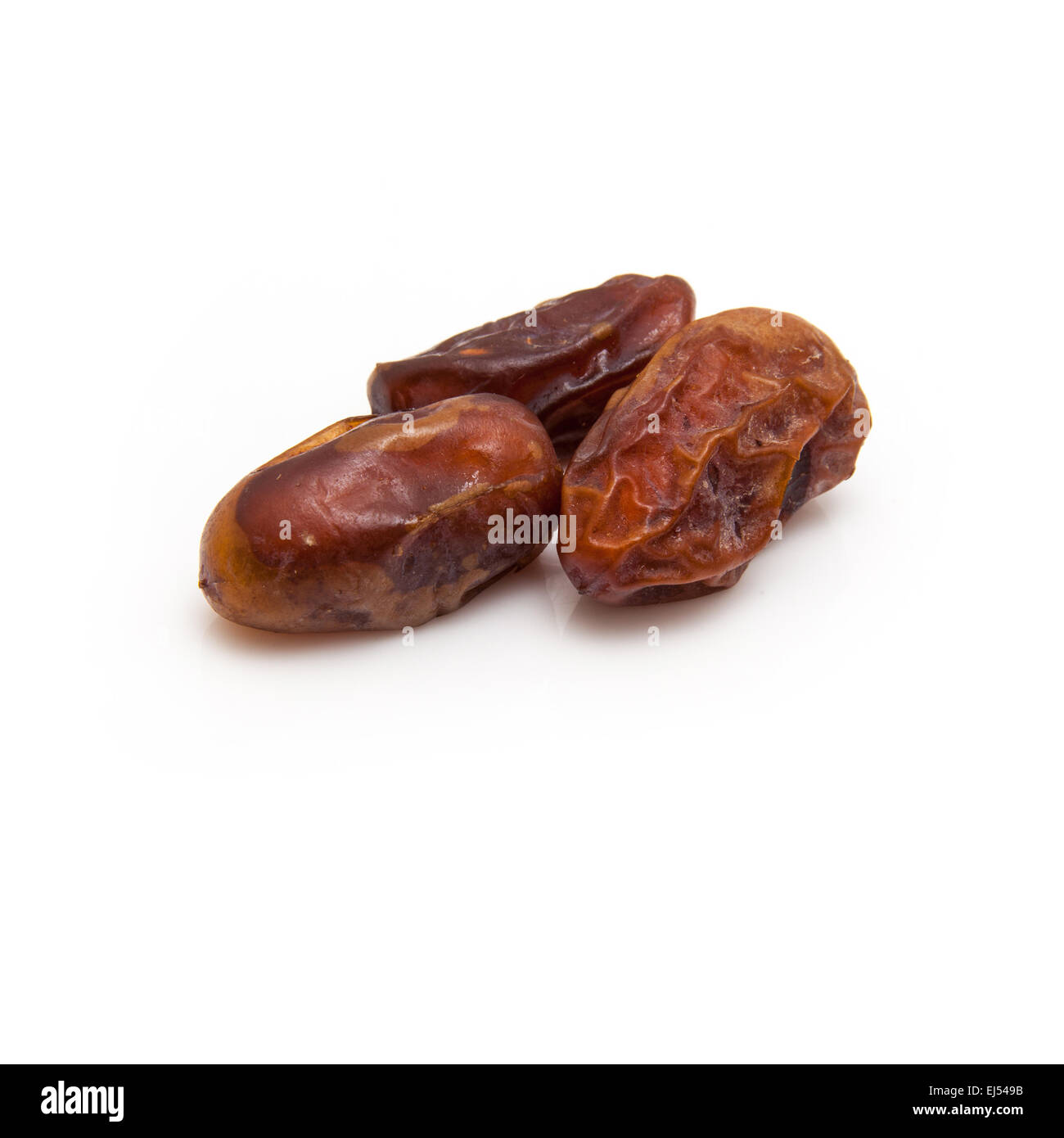 Halawi dates isolated on a white background. Halawi dates originate ...