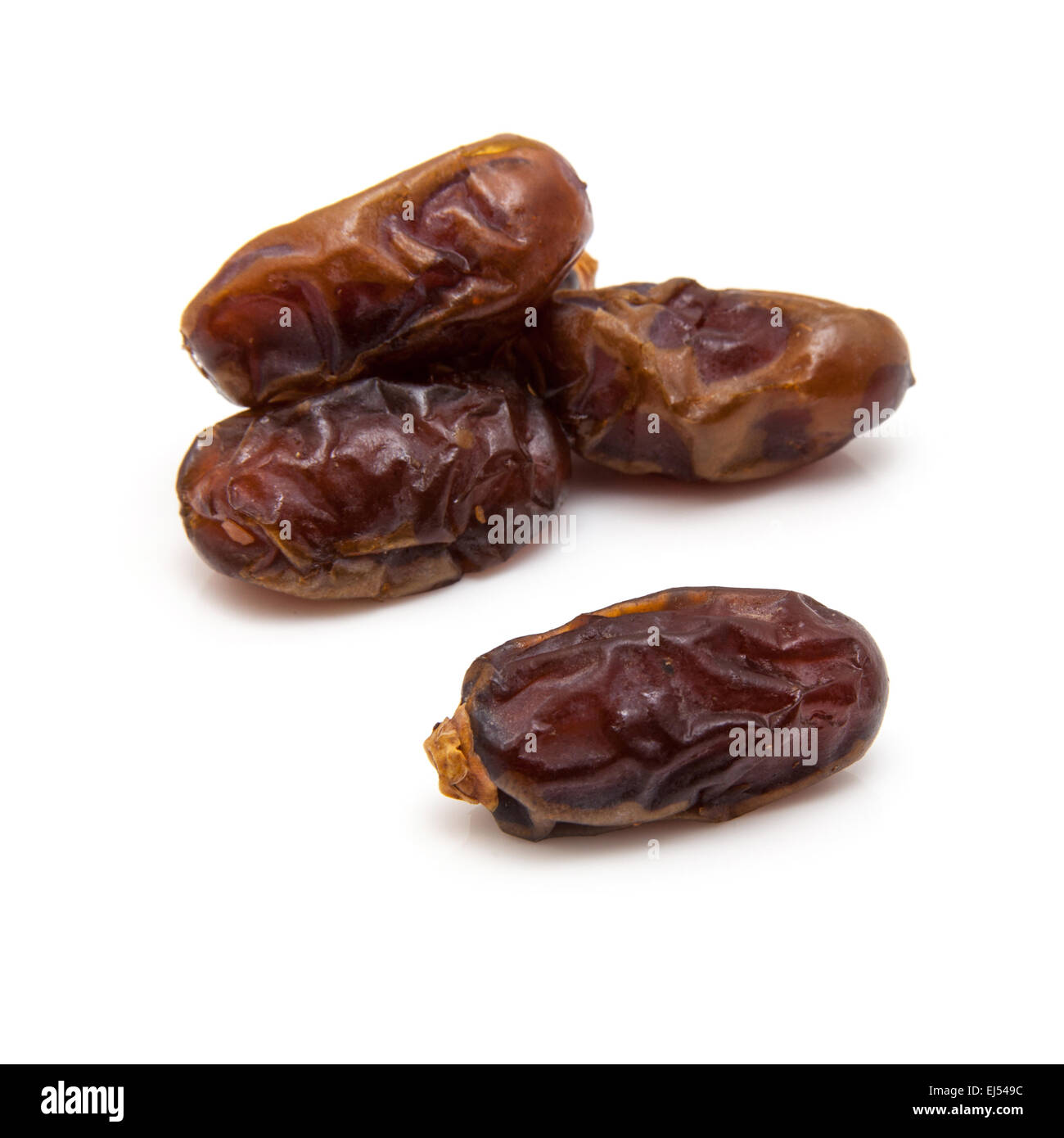 Halawi dates isolated on a white background. Halawi dates originate ...