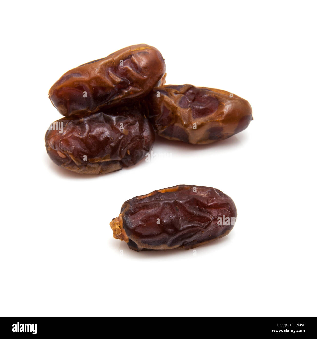 Halawi dates isolated on a white background. Halawi dates originate ...