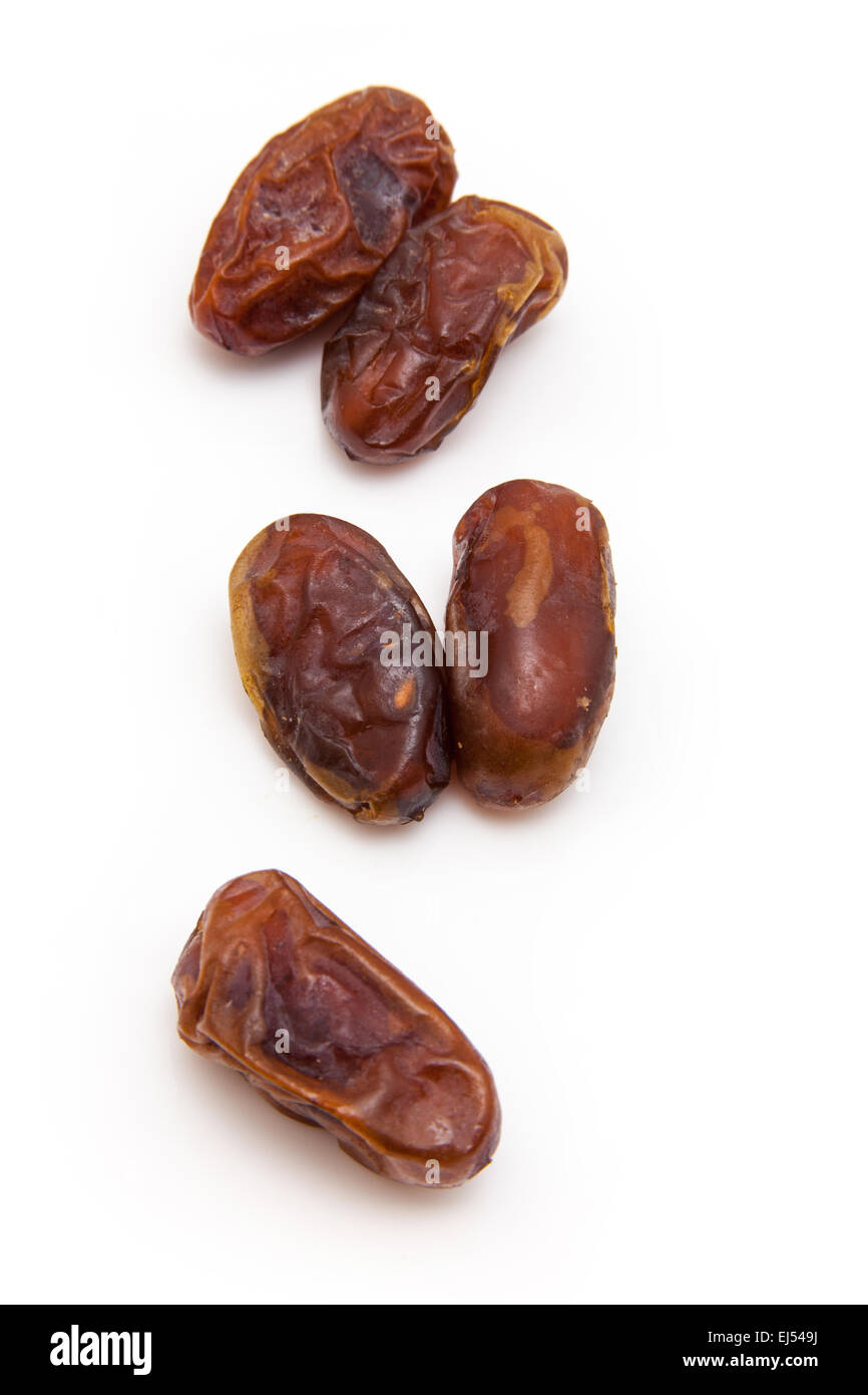 Halawi dates isolated on a white background. Halawi dates originate ...