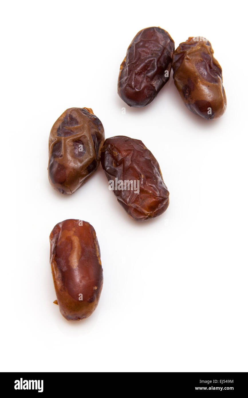 Halawi dates isolated on a white background. Halawi dates originate ...