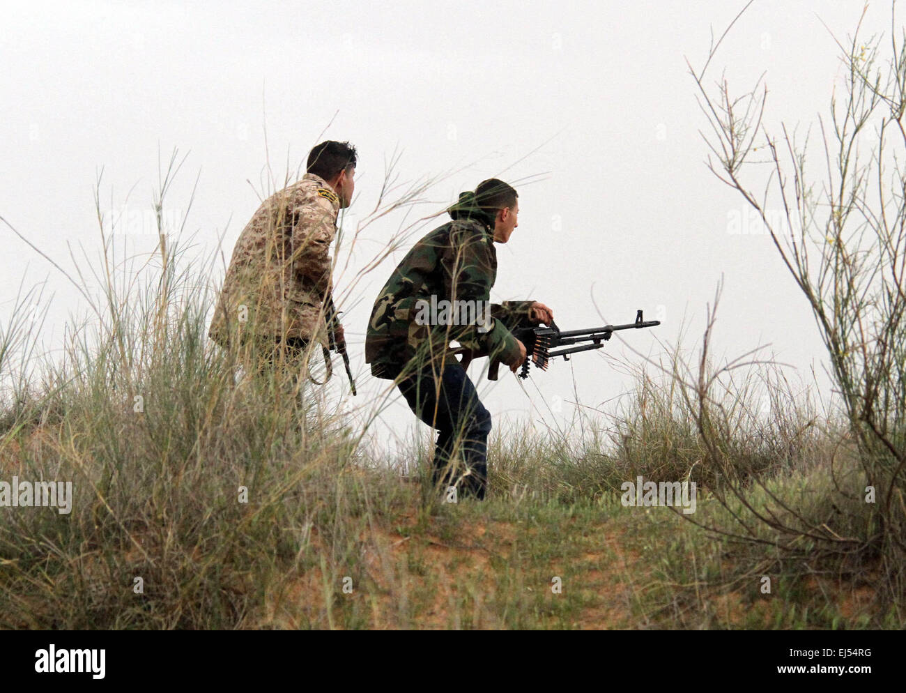 Bir al-Ghanam, Libya. 21st March, 2015. Two Libya Dawn fighters ...