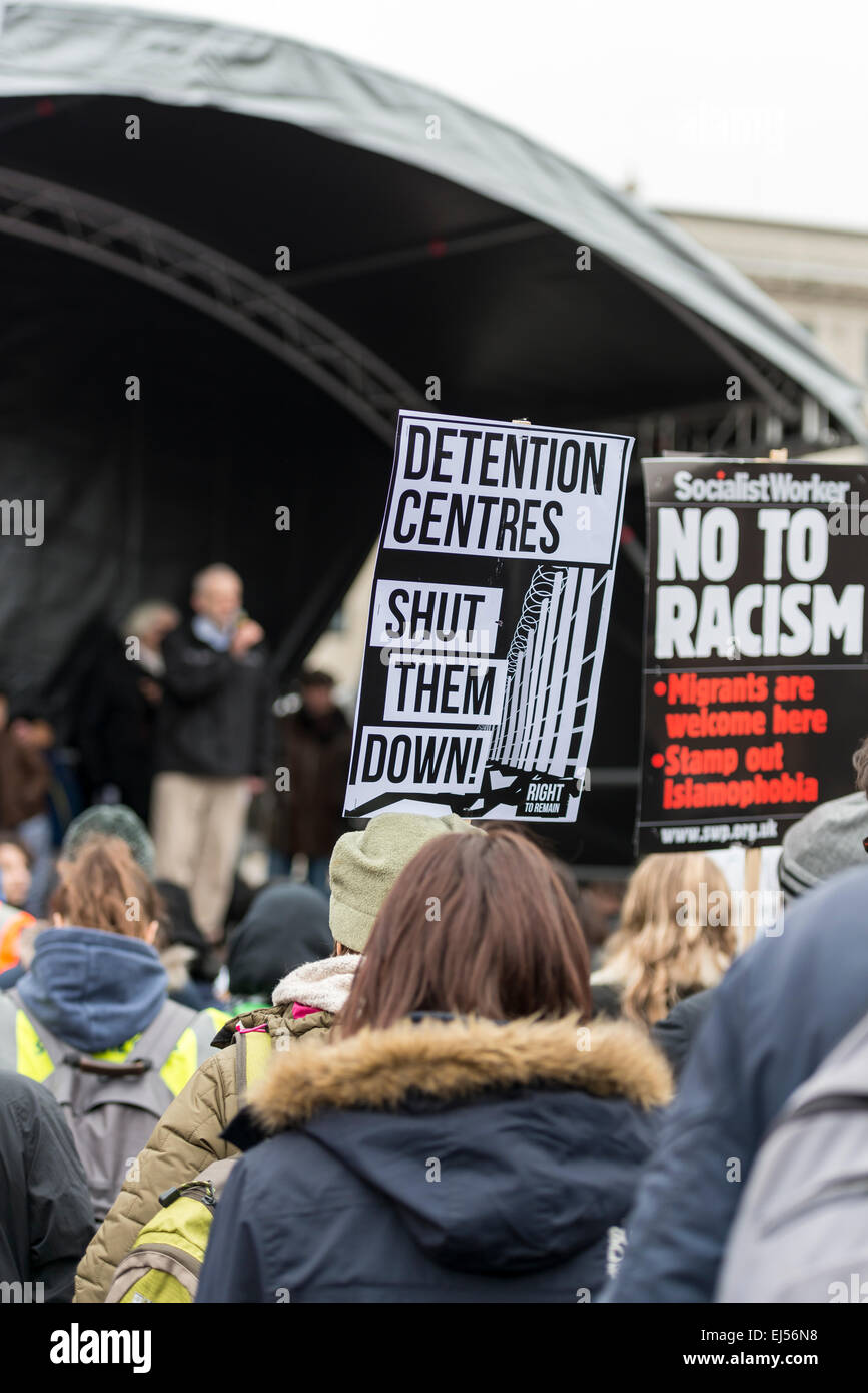 London, 21st March 2015 Anti-racism protesters watch a speaker at a ...