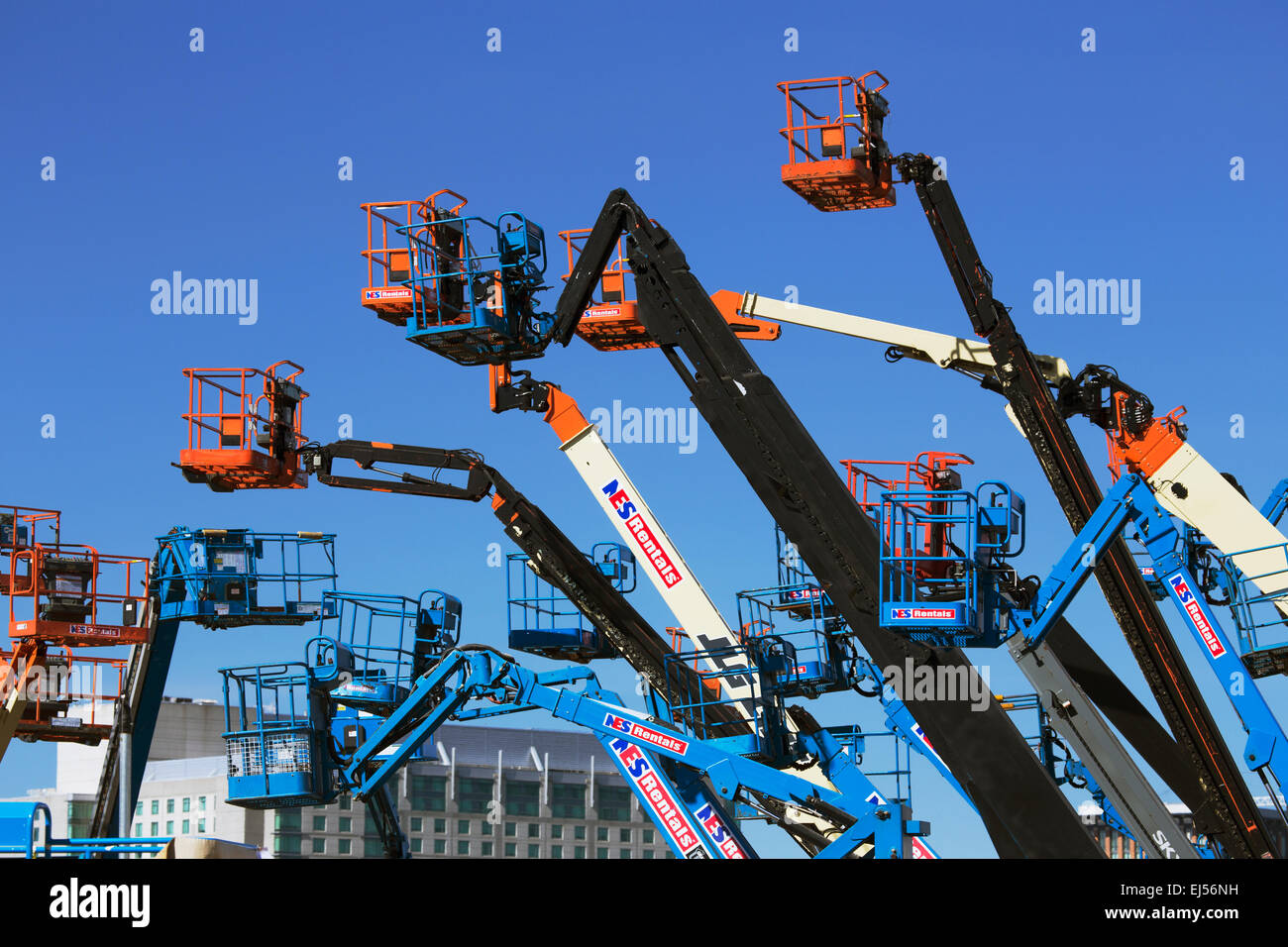 Colorful cherry pickers in Boston, Massachusetts, USA Stock Photo - Alamy