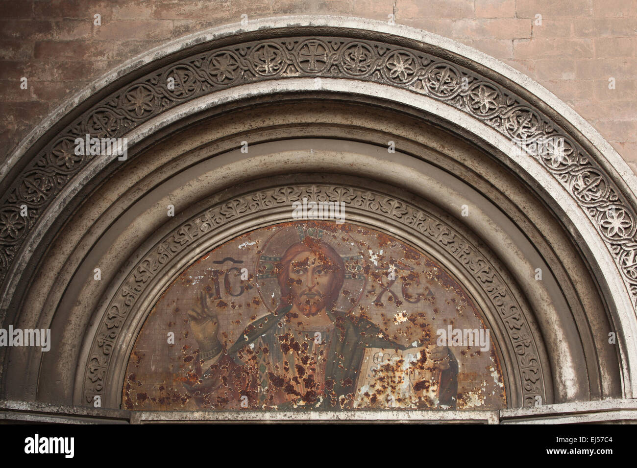 Jesus Christ. Weathered mural painting at the Campo Verano cemetery in ...