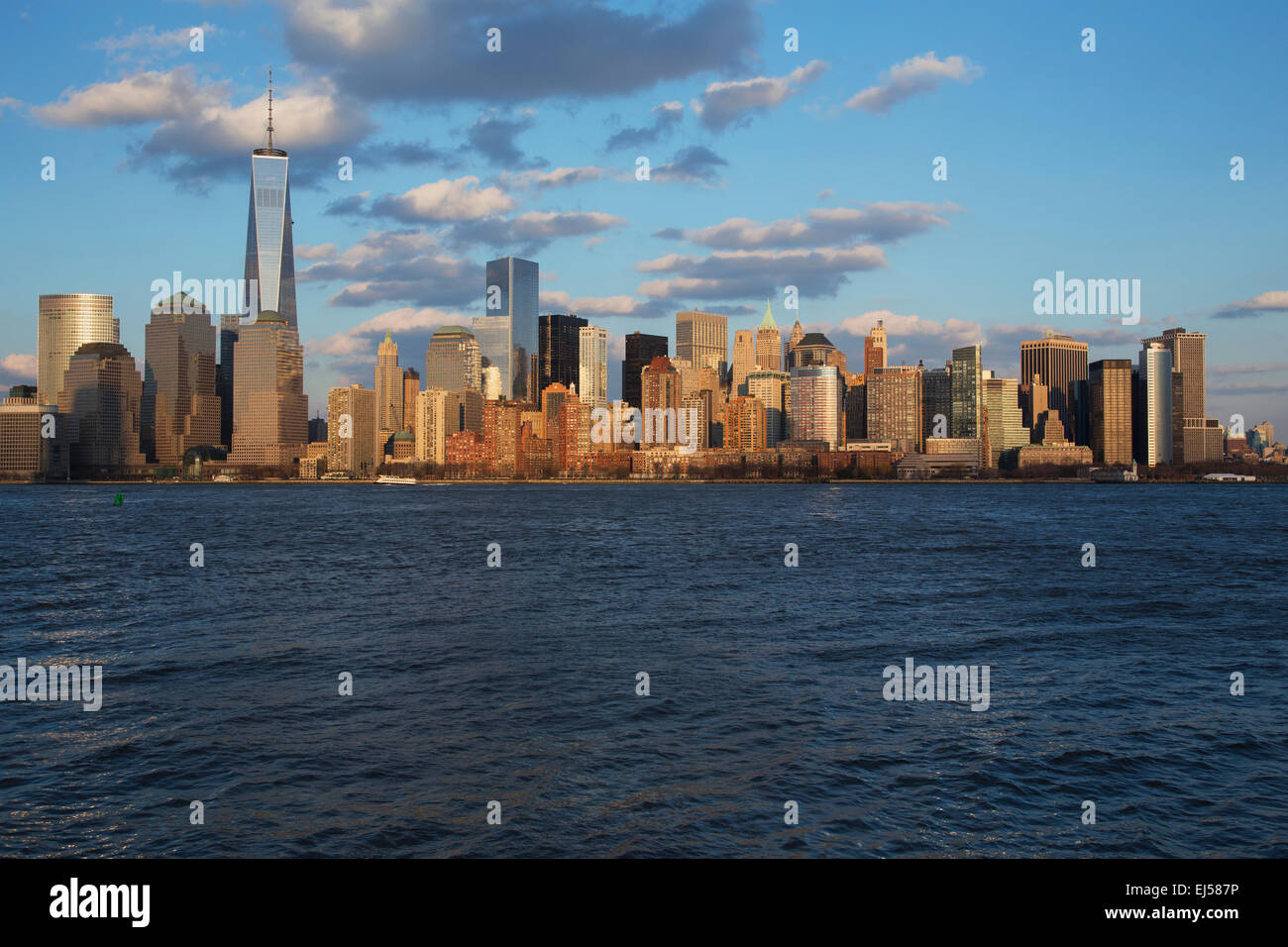 Panoramic view of New York City Skyline on water featuring One World ...