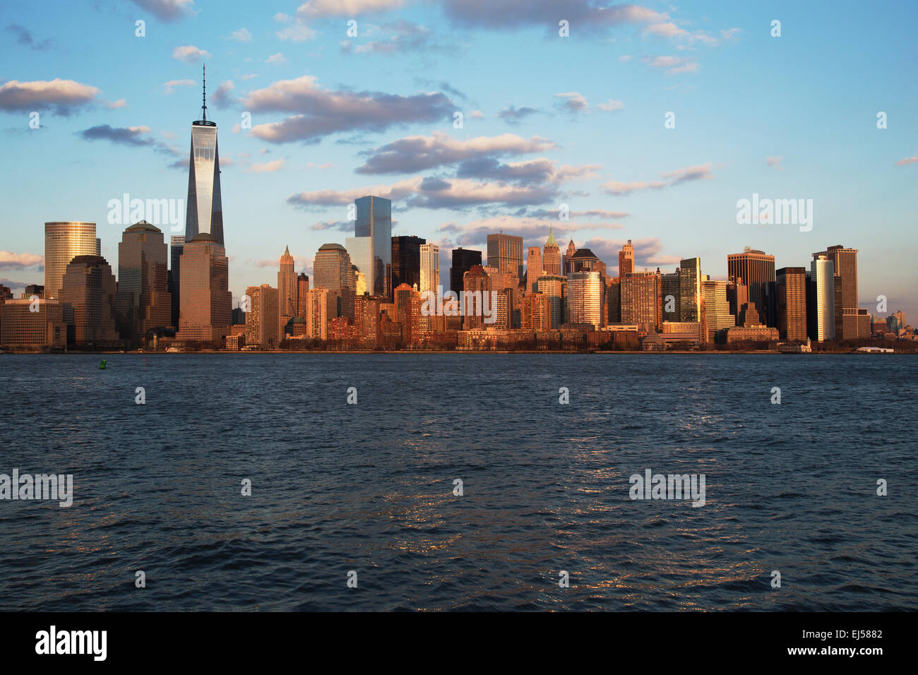 Panoramic view of New York City Skyline on water featuring One World ...