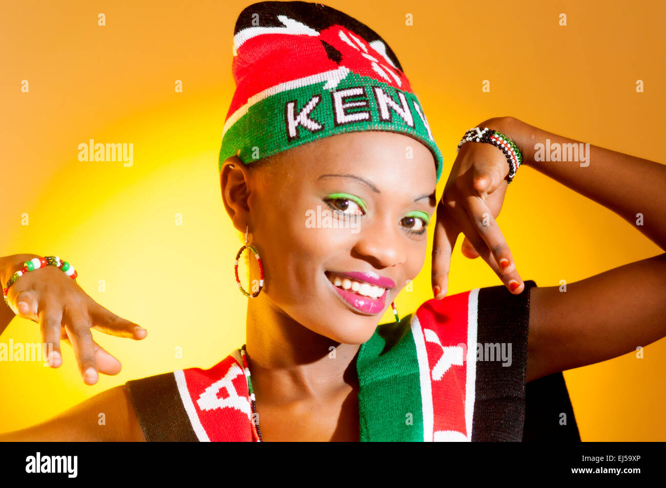 Young Kenyan woman with Kenyan colors in studio setting Stock Photo - Alamy