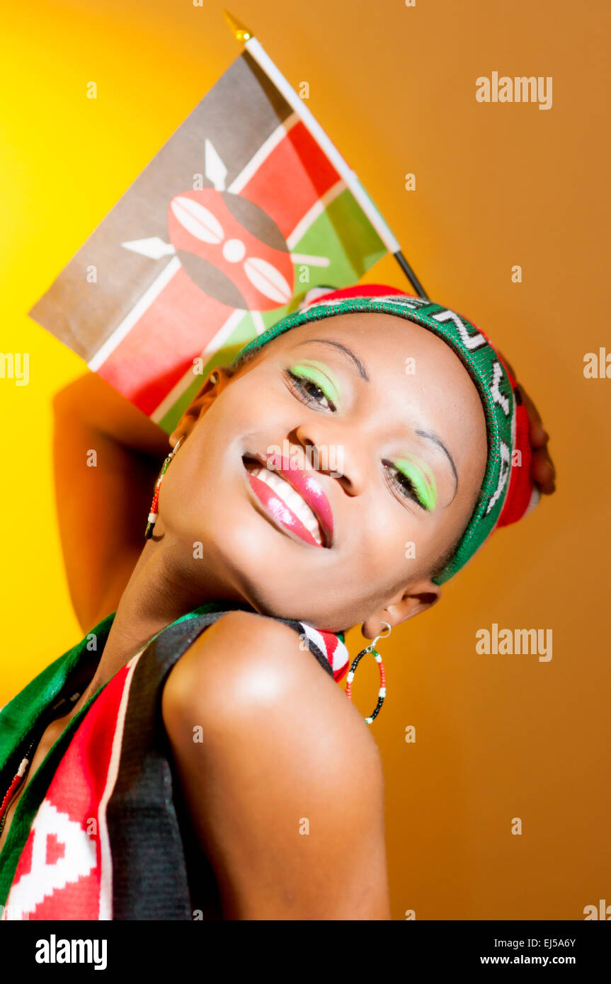 Young Kenyan woman with Kenyan colors in studio setting Stock Photo - Alamy