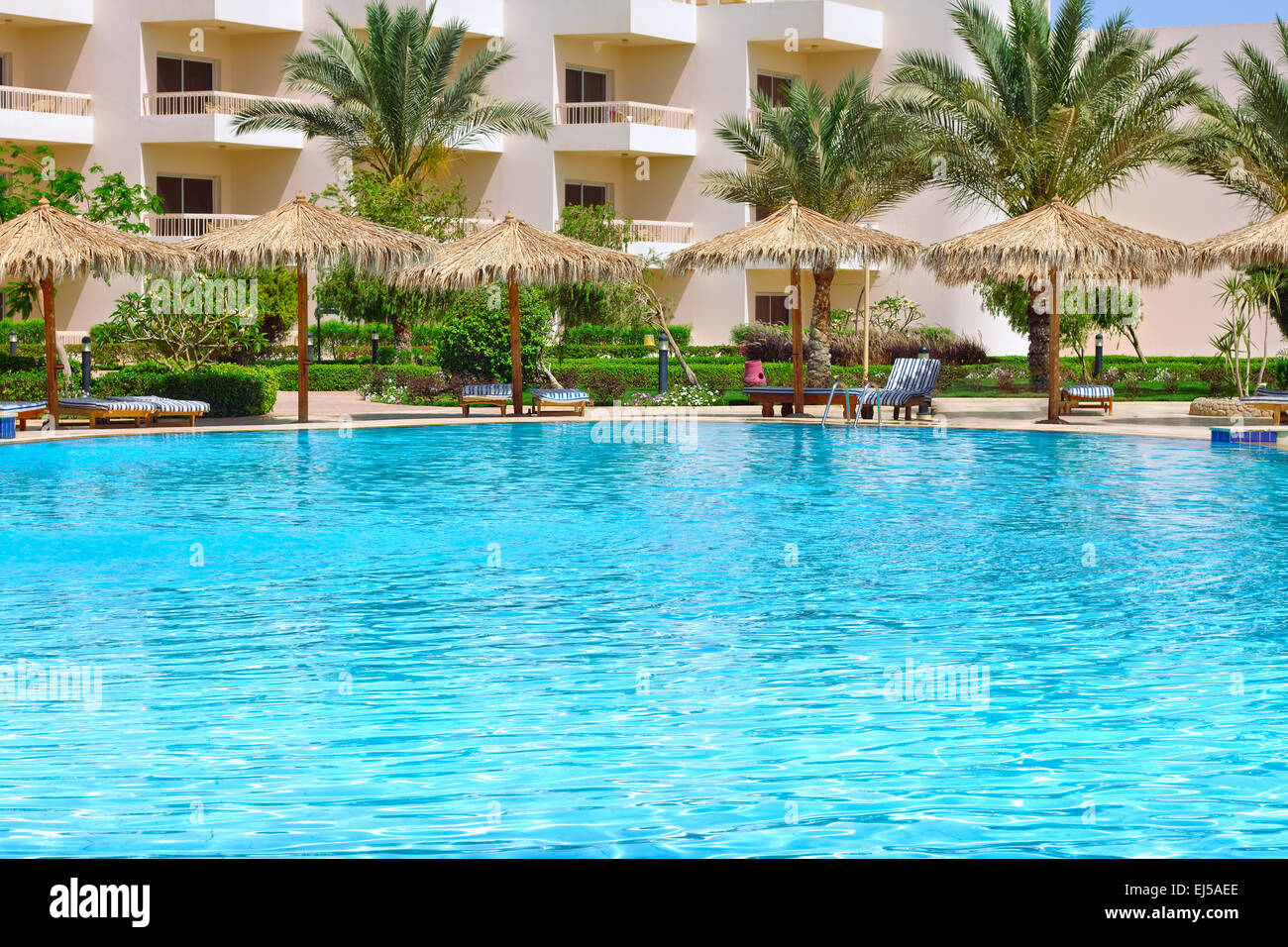Luxurious open air swimming pool at resort Stock Photo - Alamy
