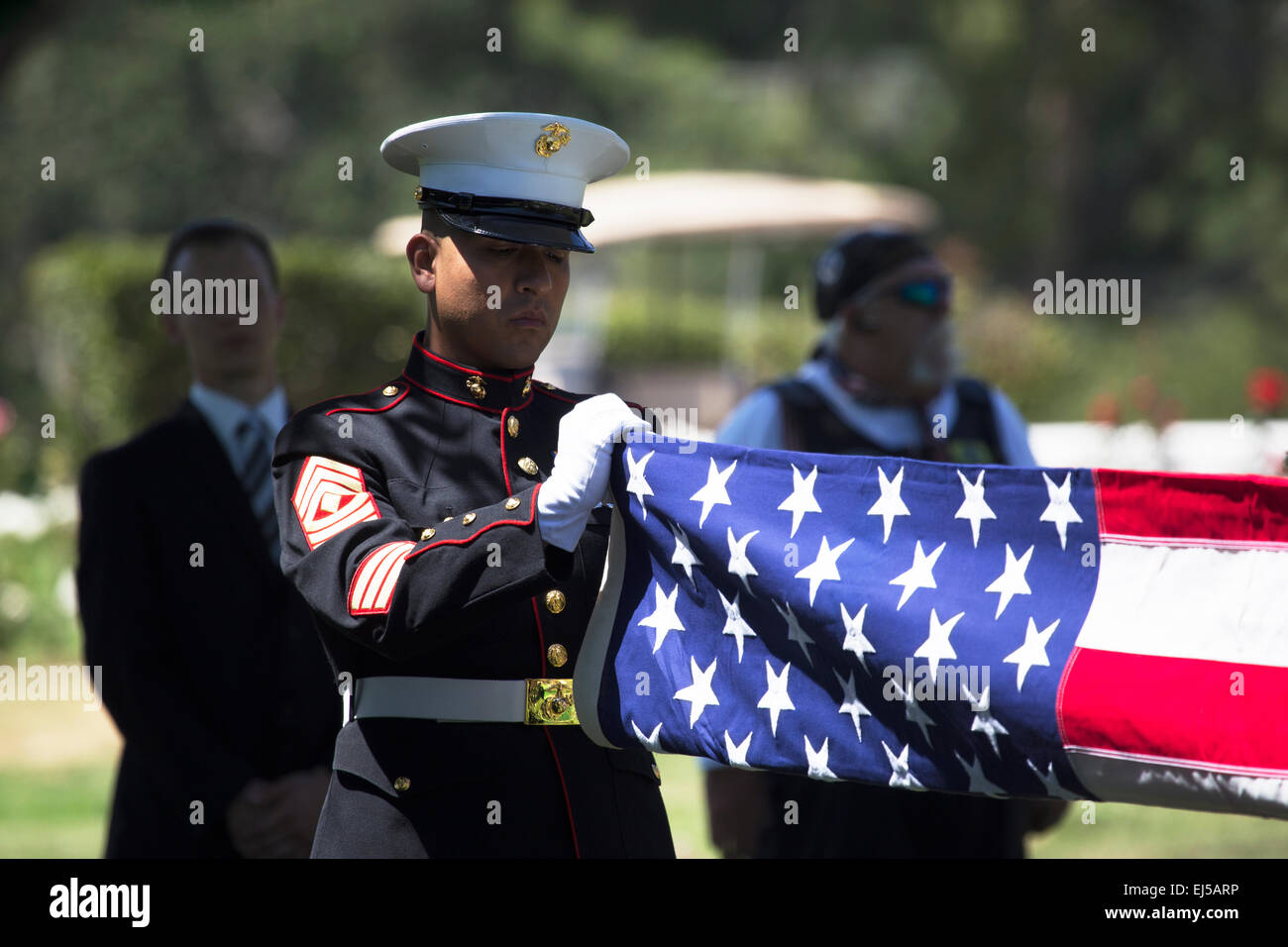 Marine folds flag at Memorial Service for fallen US Soldier, PFC Zach ...