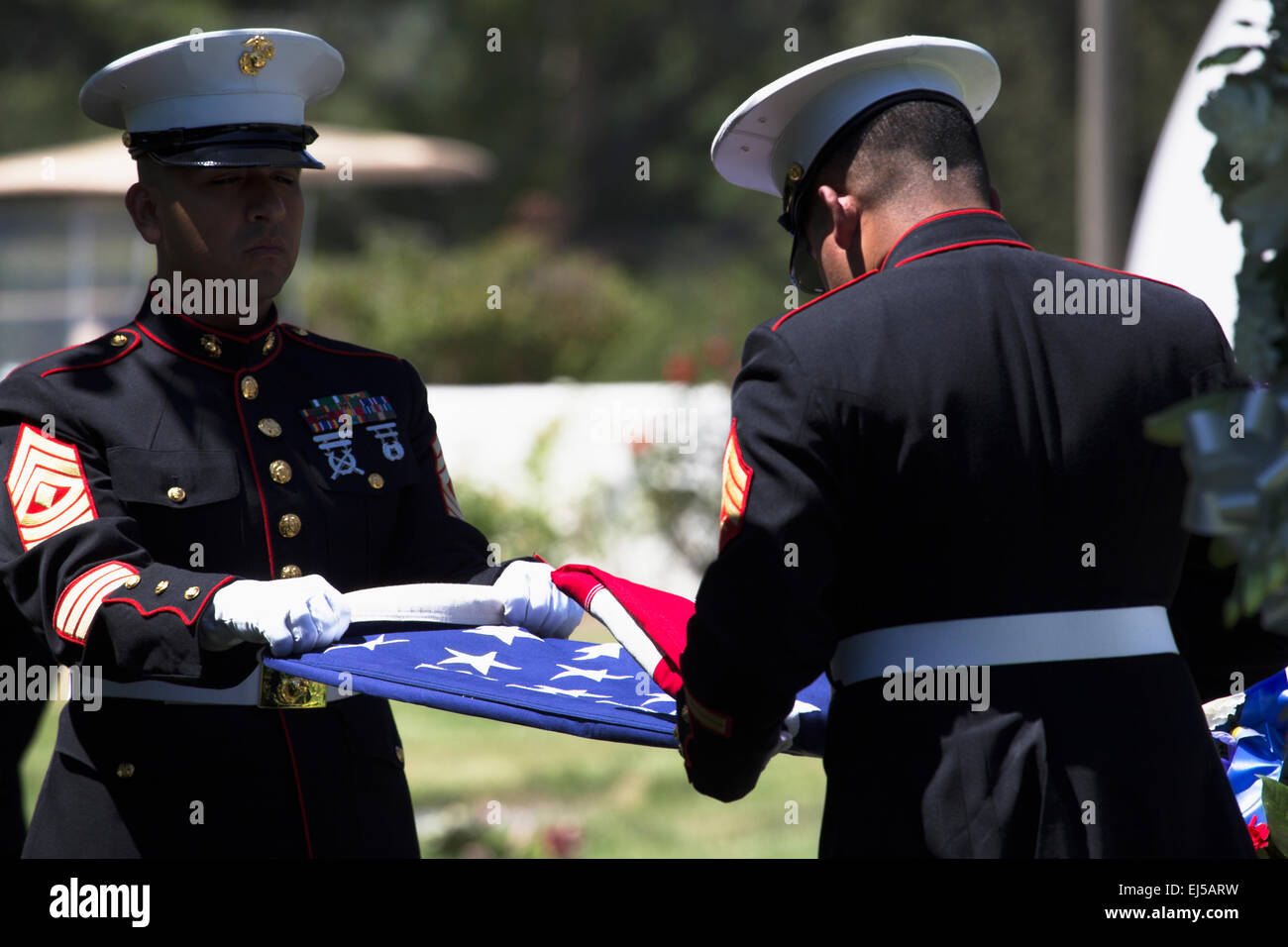 Marine folds flag at Memorial Service for fallen US Soldier, PFC Zach ...
