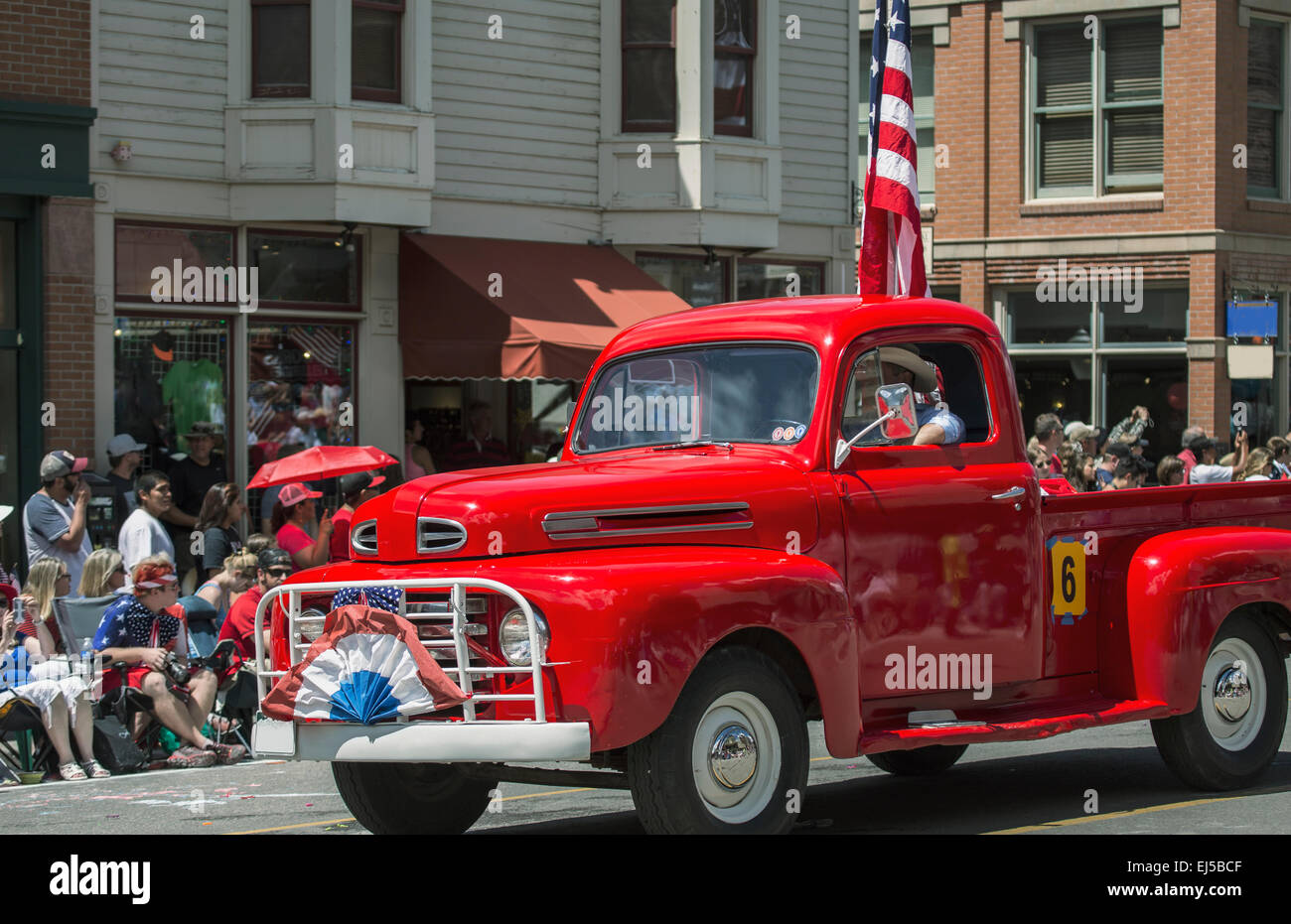 Antique Red Truck and cowboy drive in July 4, Independence Day Parade ...