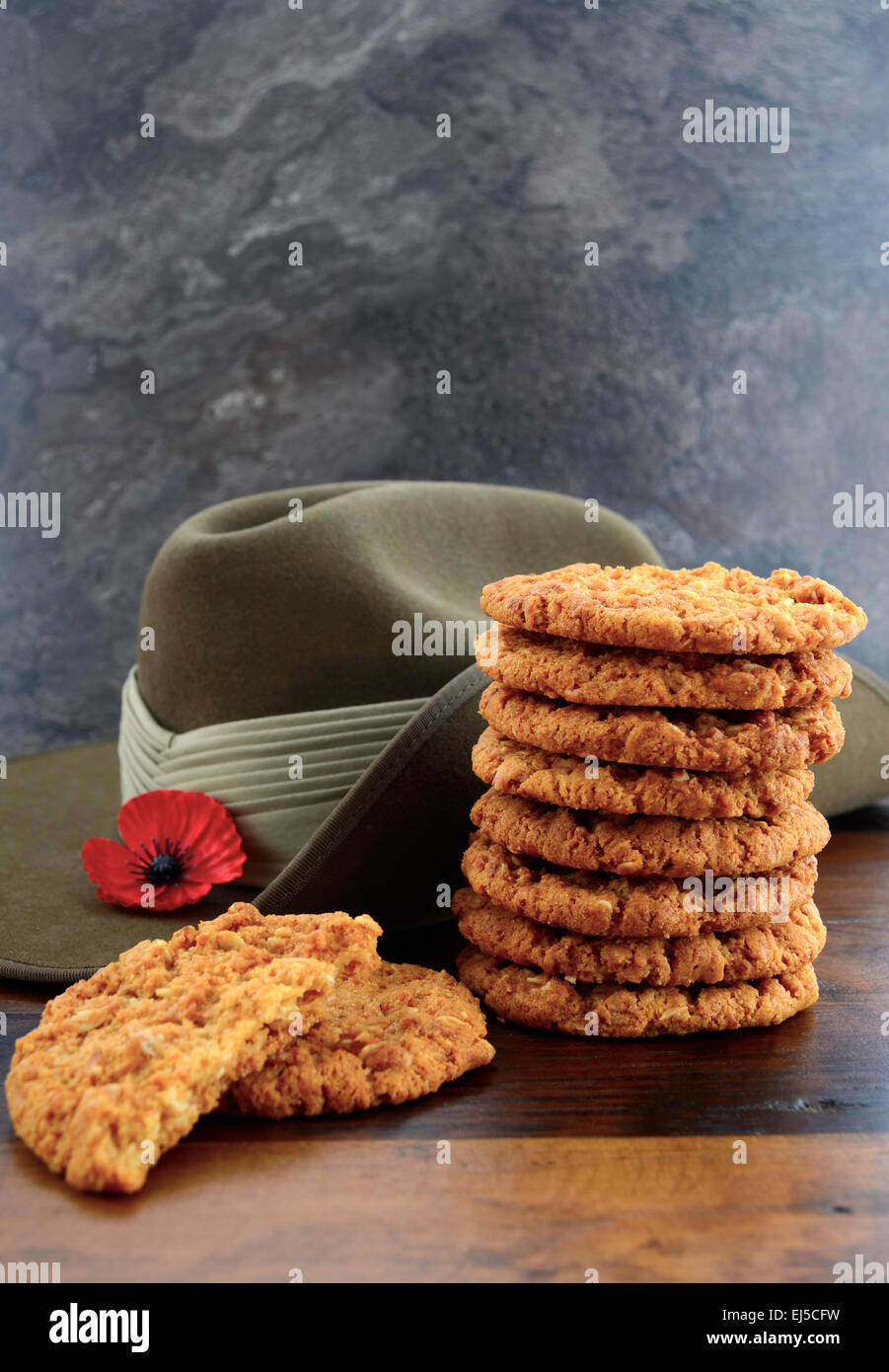 Australian Anzac biscuits with soldier slouch hat on dark vintage ...