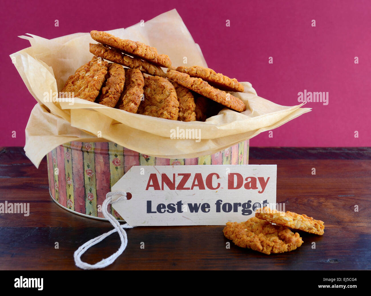 Australian Anzac biscuits in vintage biscuit tin container with Lest We ...