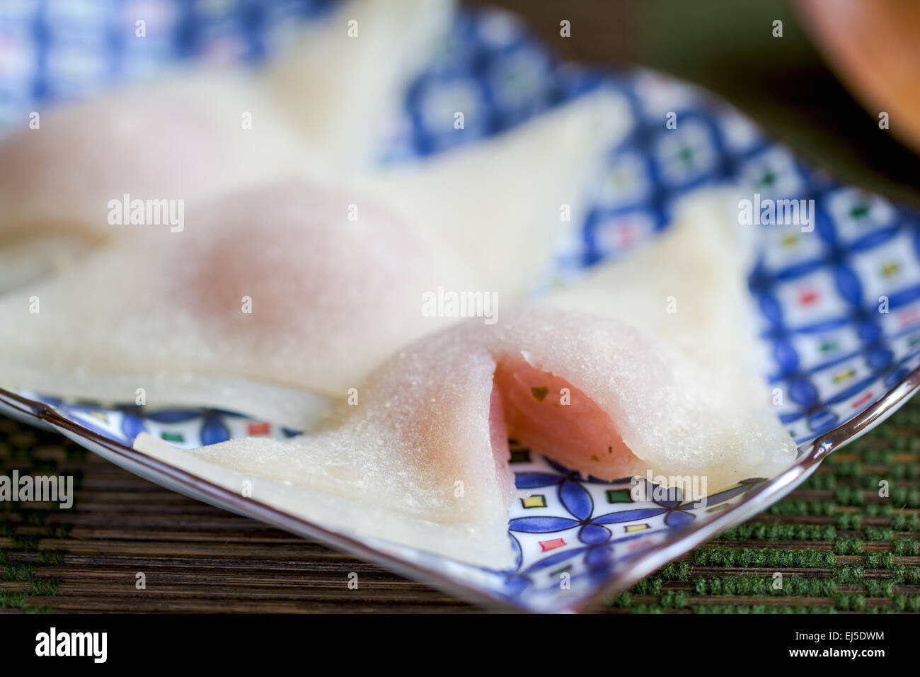 Traditional Kyoto Sakura Mochi in triangle shape Stock Photo - Alamy
