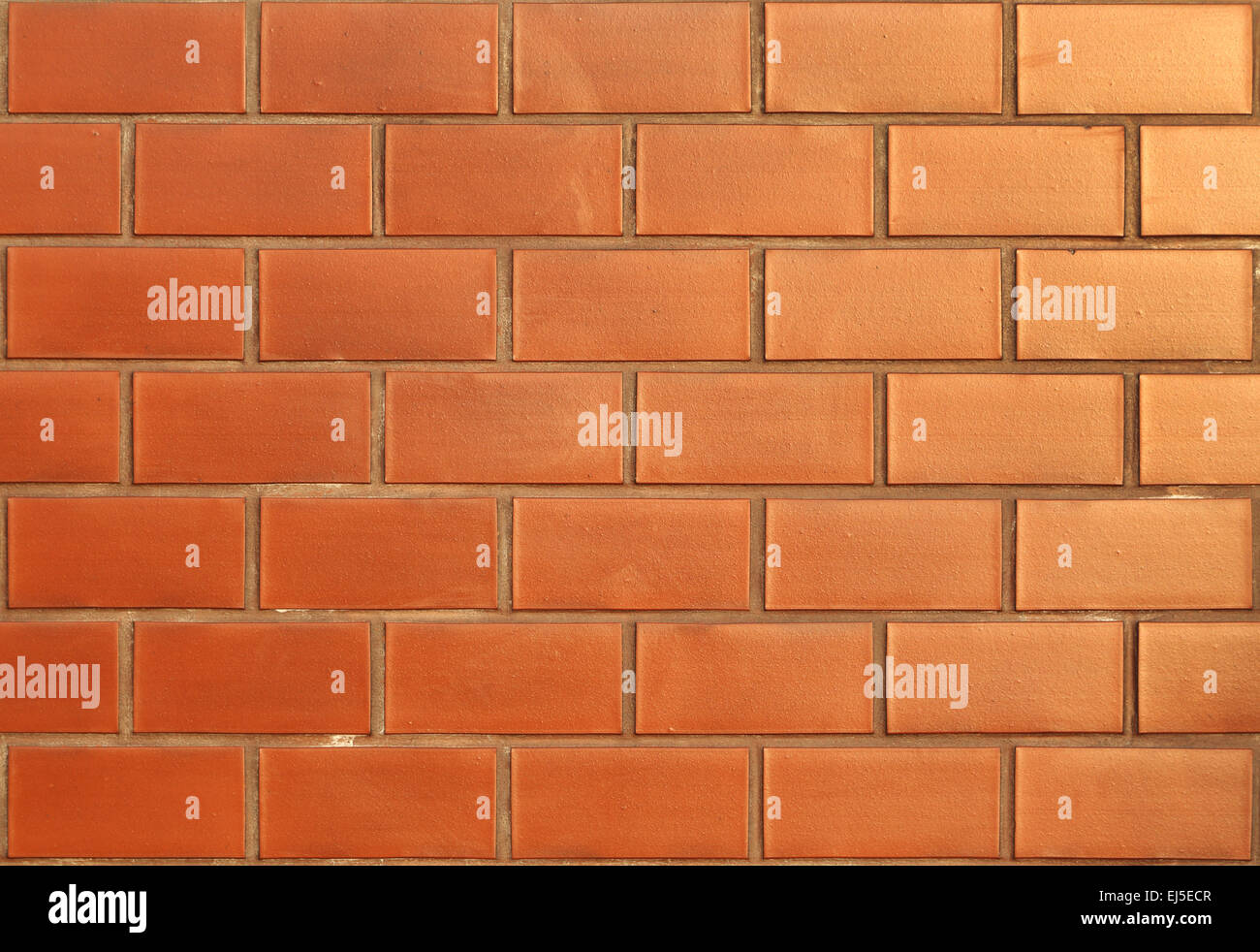 orange stone brick wall texture and background Stock Photo - Alamy