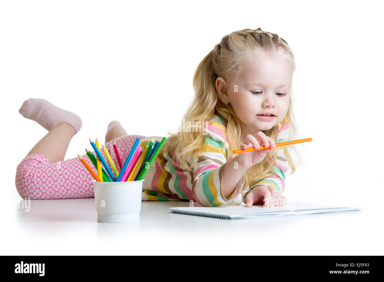 child girl drawing with pencils in nursery Stock Photo - Alamy