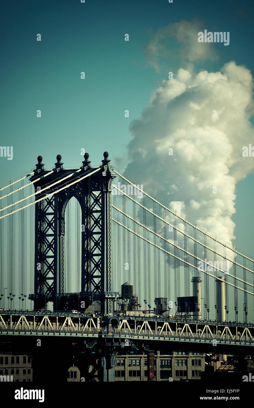Manhattan Bridge with chimney smoke in New York City Stock Photo - Alamy