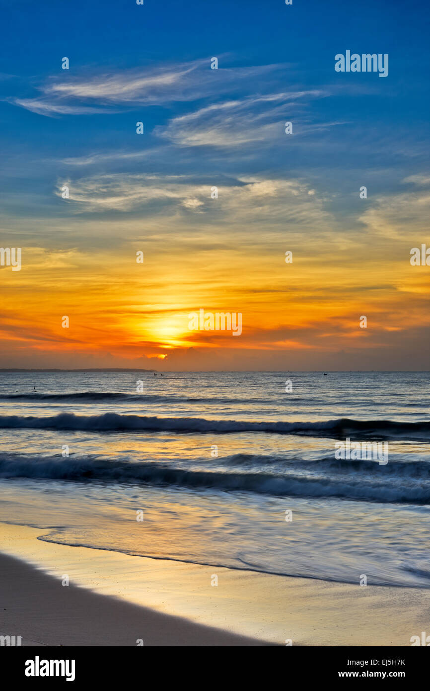 Sunrise on the beach. Mui Ne, Binh Thuan Province, Vietnam Stock Photo ...