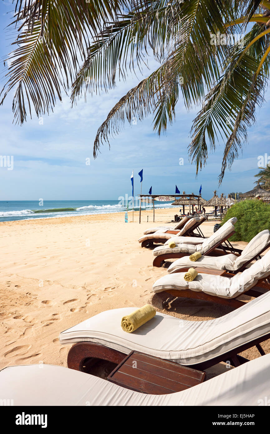 Lounge chairs on the beach. Mui Ne, Binh Thuan Province, Vietnam Stock ...