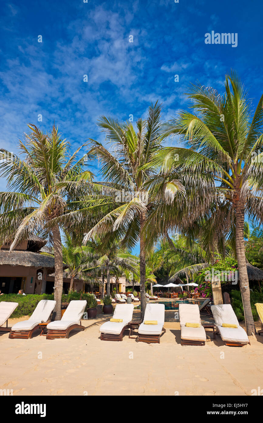 Lounge chairs on the beach. Mui Ne, Binh Thuan Province, Vietnam Stock ...