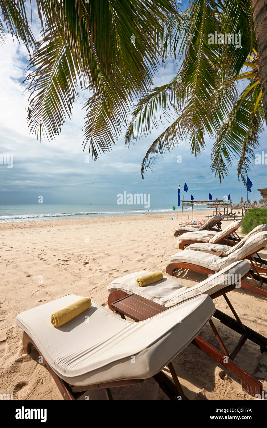 Lounge chairs on the beach. Mui Ne, Binh Thuan Province, Vietnam Stock ...