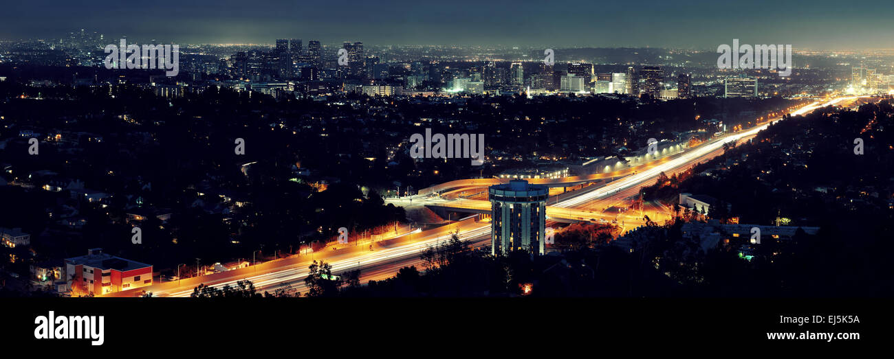 Los Angeles at night with urban buildings and highway Stock Photo - Alamy