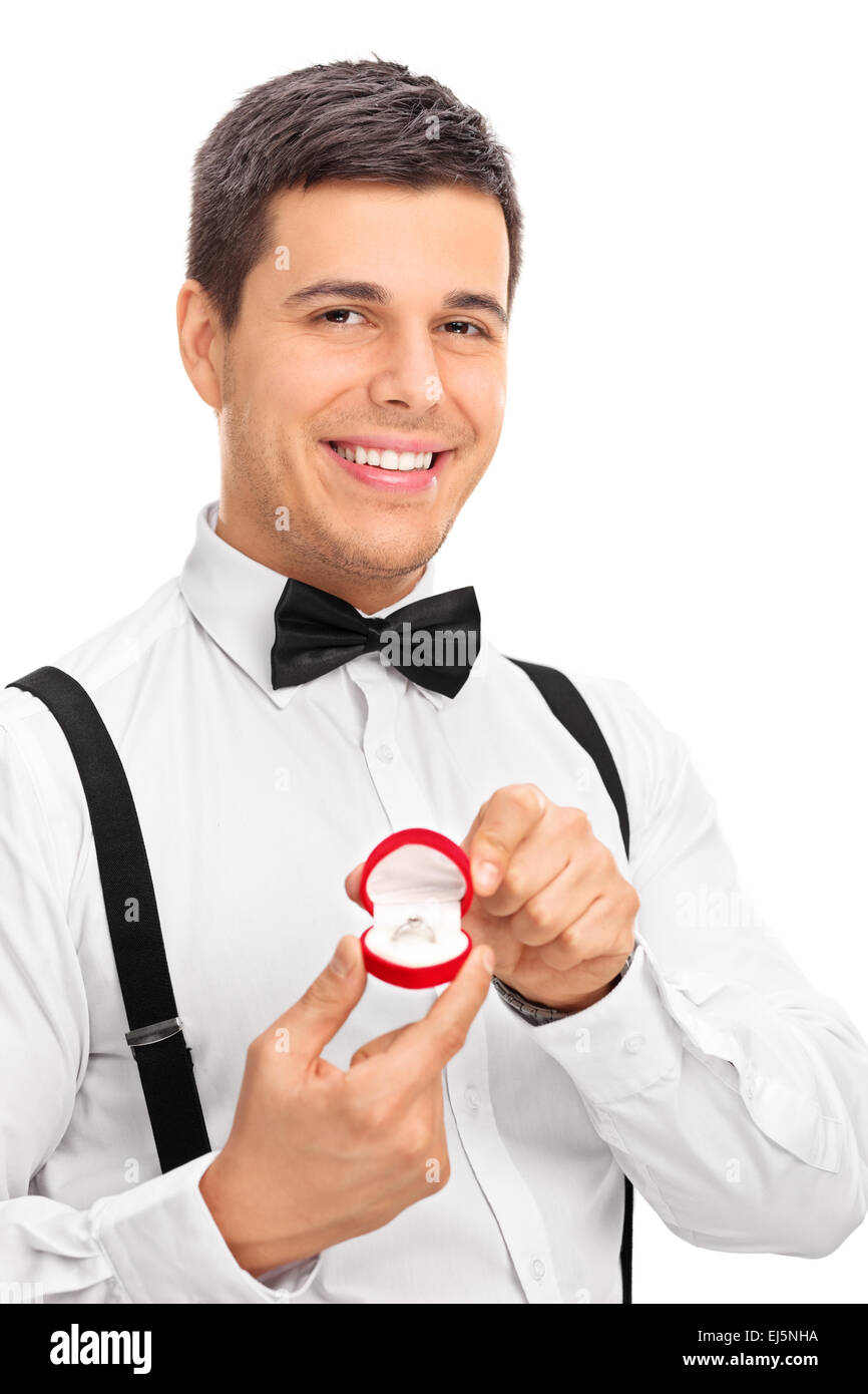 Elegant young man holding an engagement ring Stock Photo - Alamy