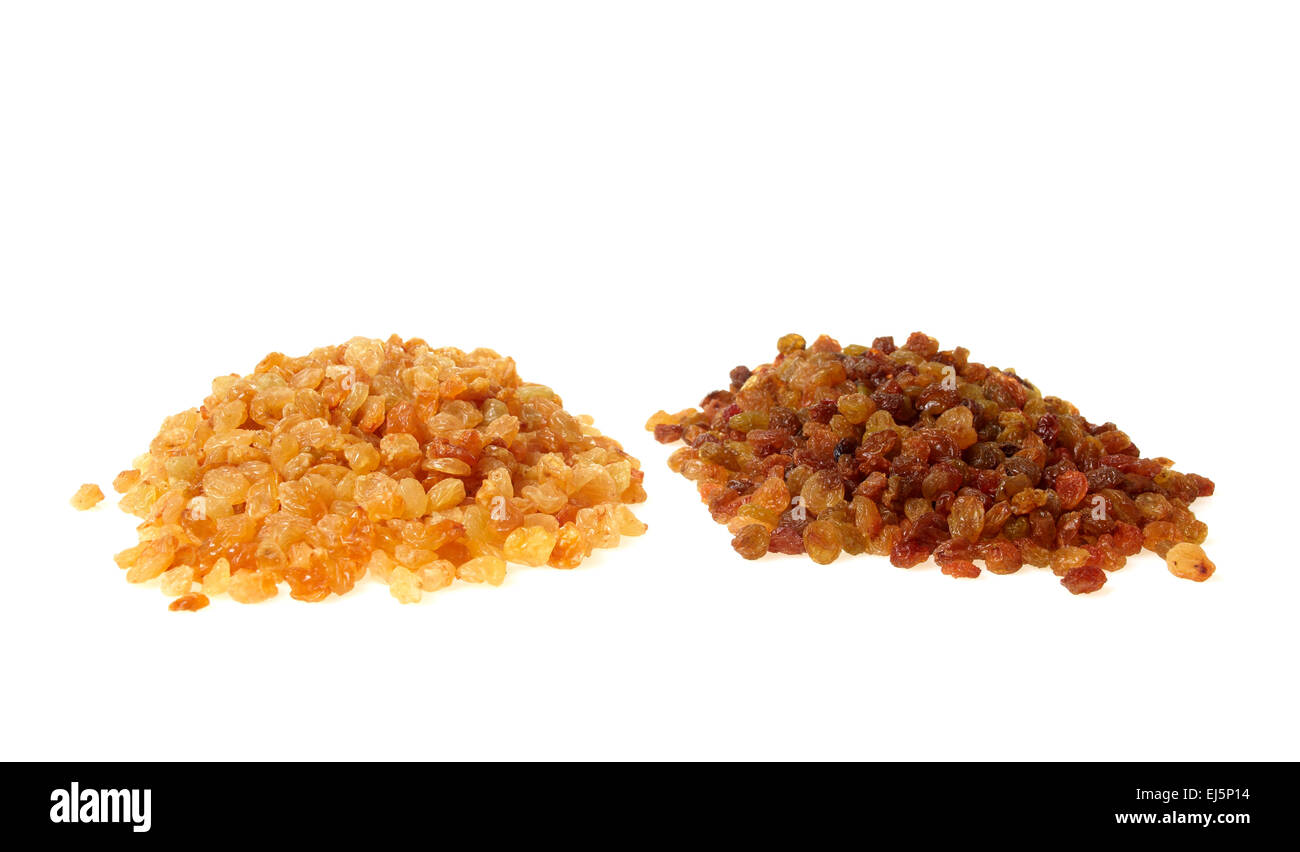 Two heaps of raisins isolated on white Stock Photo - Alamy