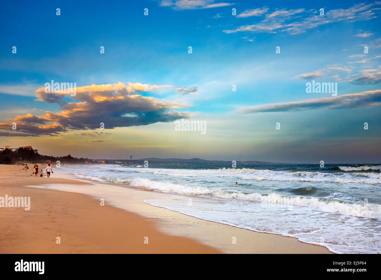 View of Mui Ne sandy beach at sunset. Mui Ne, Binh Thuan Province ...