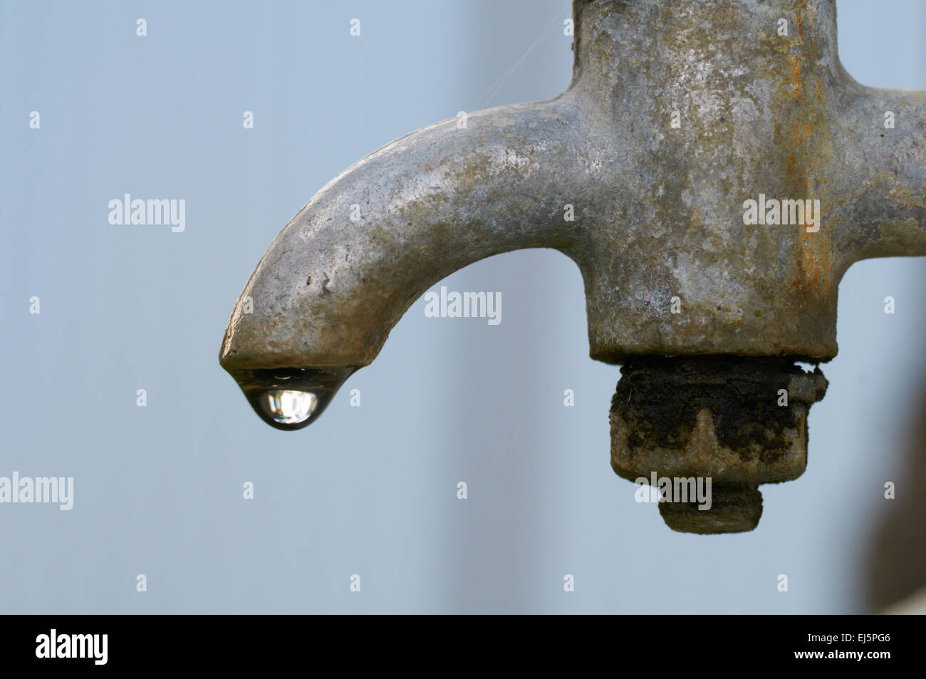 Old water tap with a water drop. Macro shot Stock Photo - Alamy