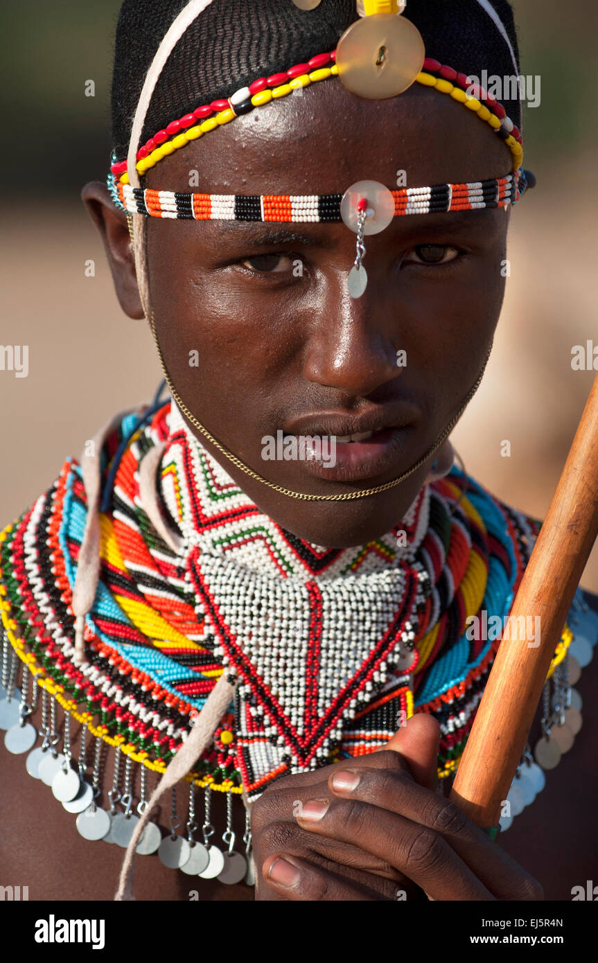 A Samburu Moran (warrior) with beaded necklaces and headdress, South ...