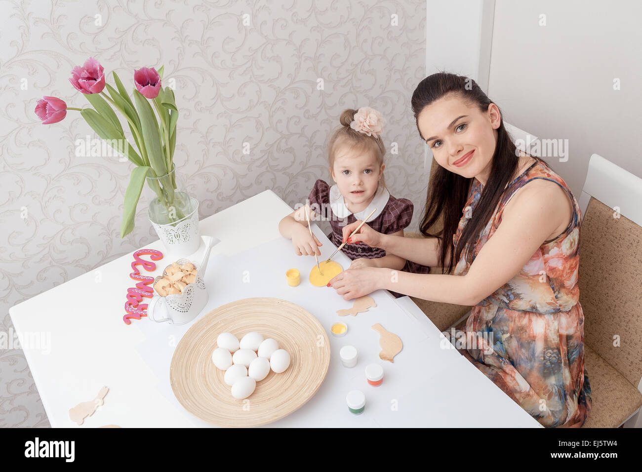 Mother and daughter with Easter eggs Stock Photo - Alamy