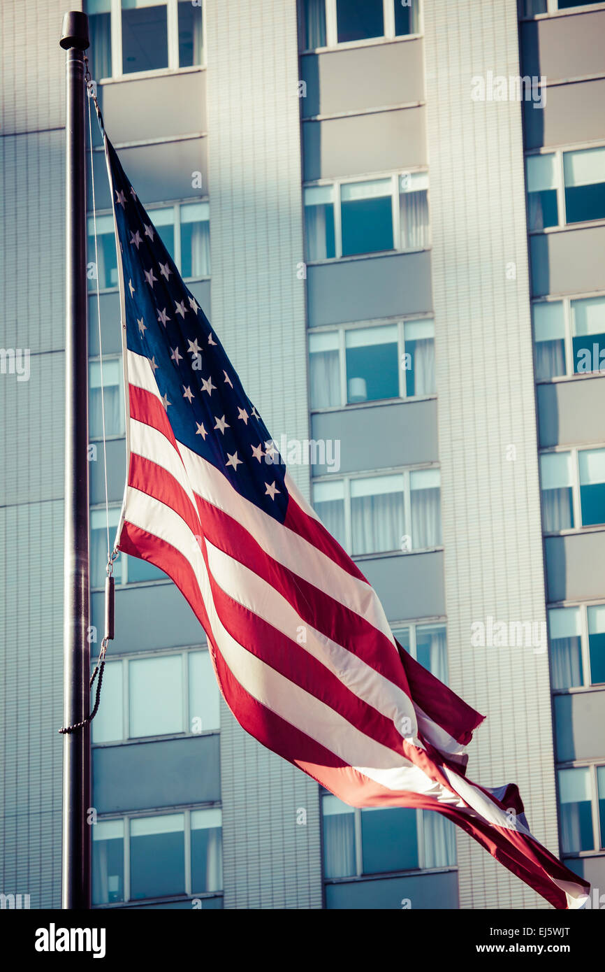 American flags outside a building Stock Photo - Alamy