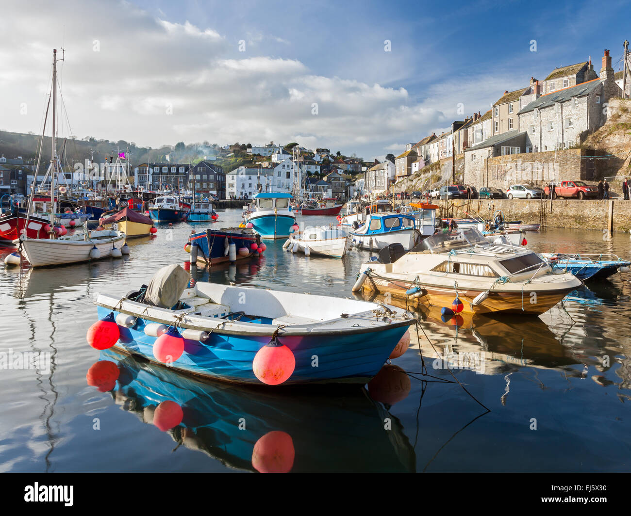 Small fishing boats in the historic harbour at Mevagissey Cornwall ...
