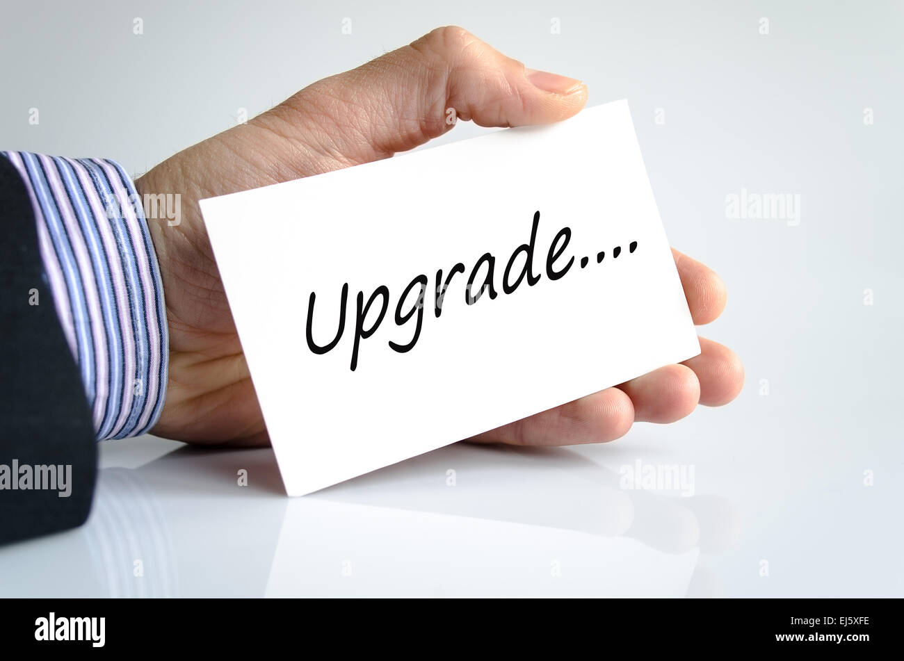 Business hand writing text Upgrade Stock Photo - Alamy