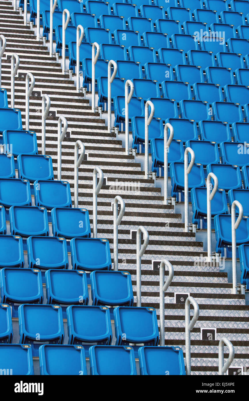Blue stadium seats and a metallic staircase Stock Photo - Alamy