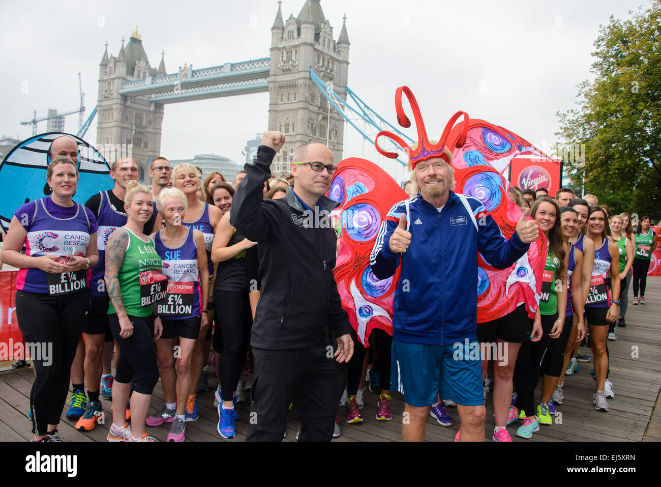 Sir Richard Branson and Hugh Brasher along with charity runners who ...