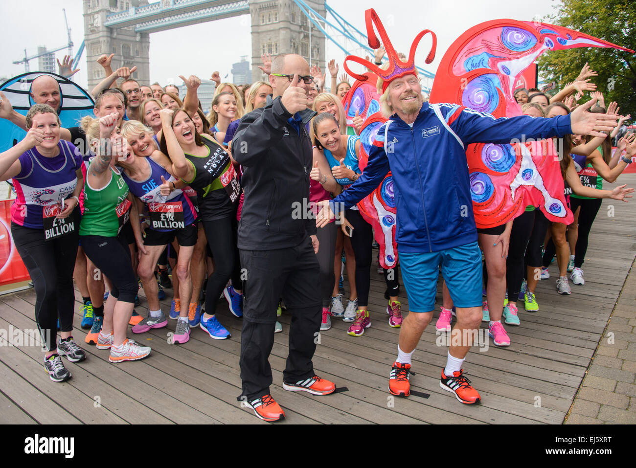 Sir Richard Branson and Hugh Brasher along with charity runners who ...