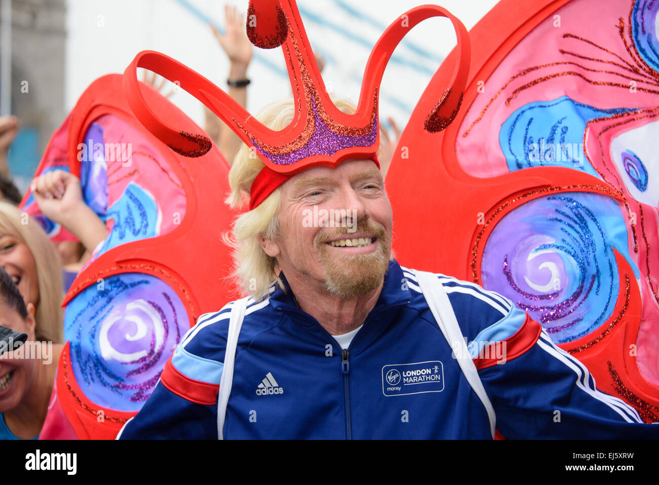 Sir Richard Branson and Hugh Brasher along with charity runners who ...