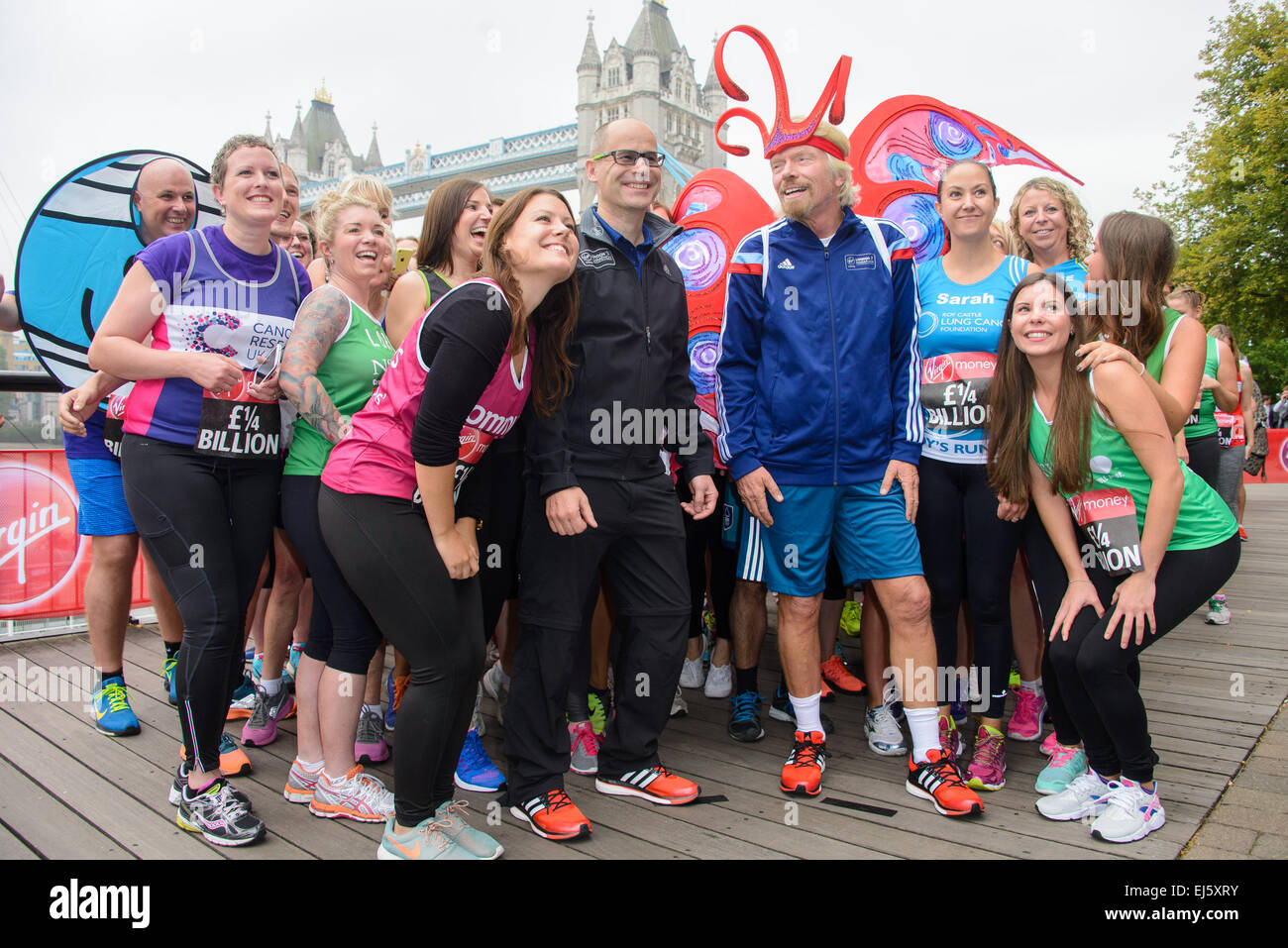 Sir Richard Branson and Hugh Brasher along with charity runners who ...