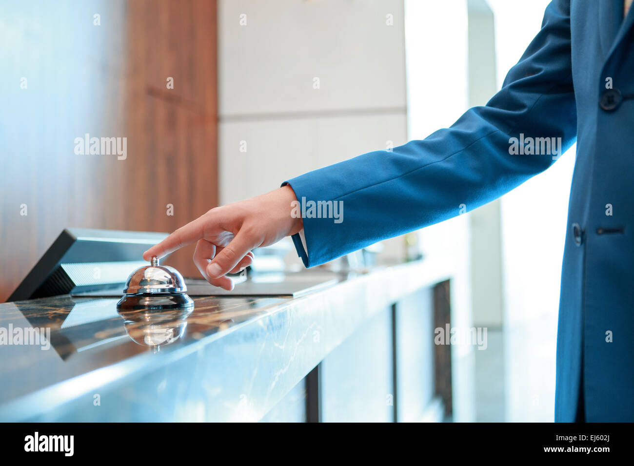 Hotel service bell at reception Stock Photo - Alamy