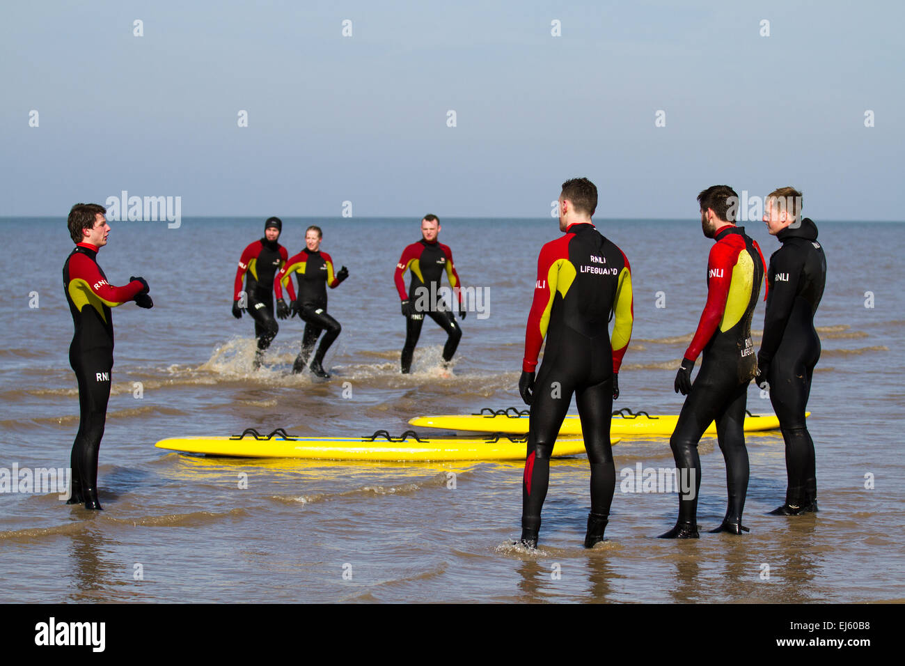 RNLI volunteer Lifeguards practice rescue land-based ﬁrst aid training ...