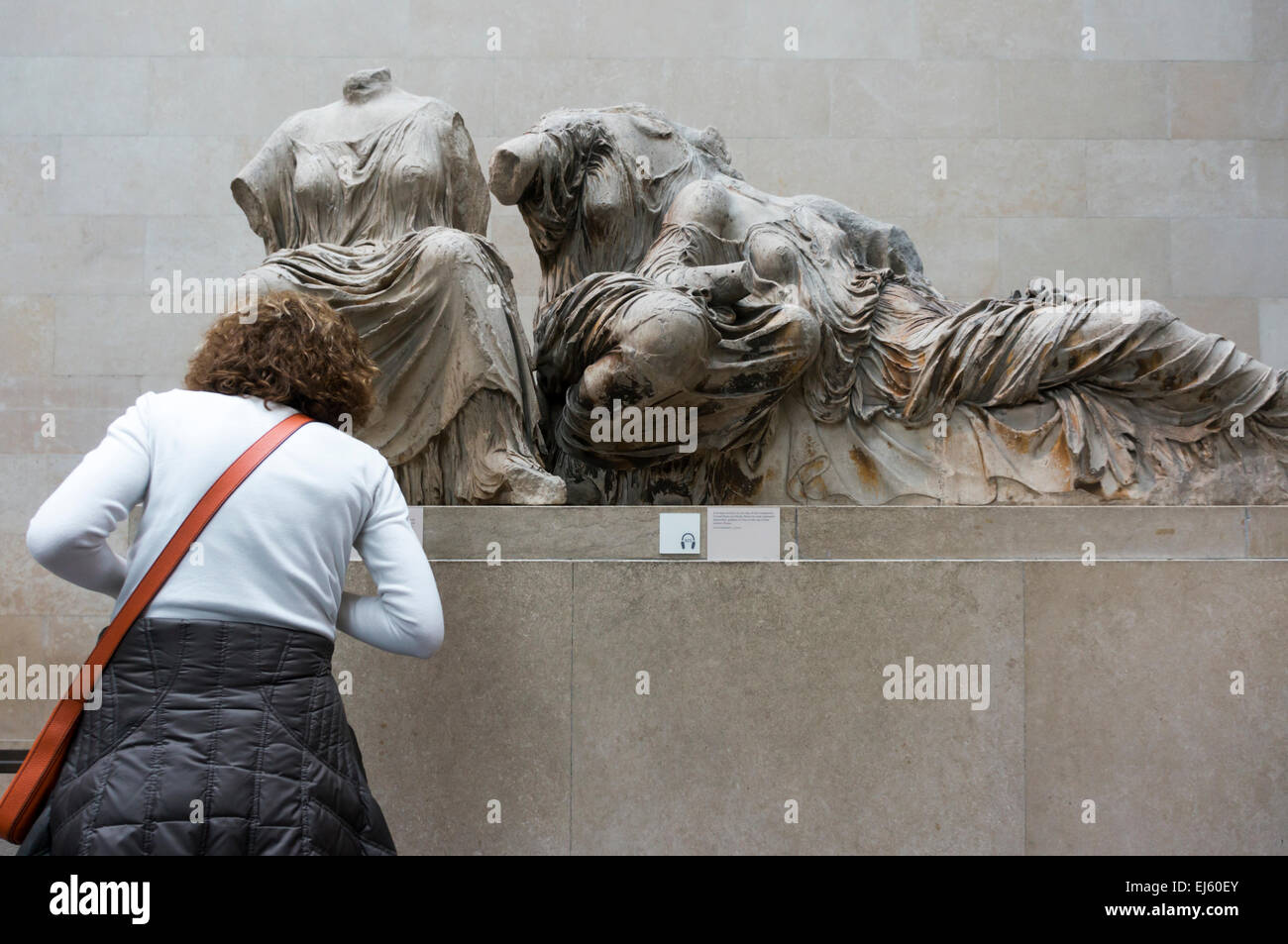 Elgin Marbles. Visitor & sculpture of three goddesses from east ...
