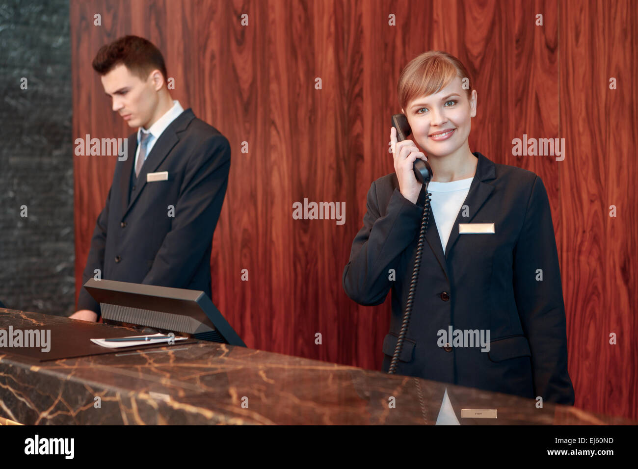 Receptionist hi-res stock photography and images - Alamy