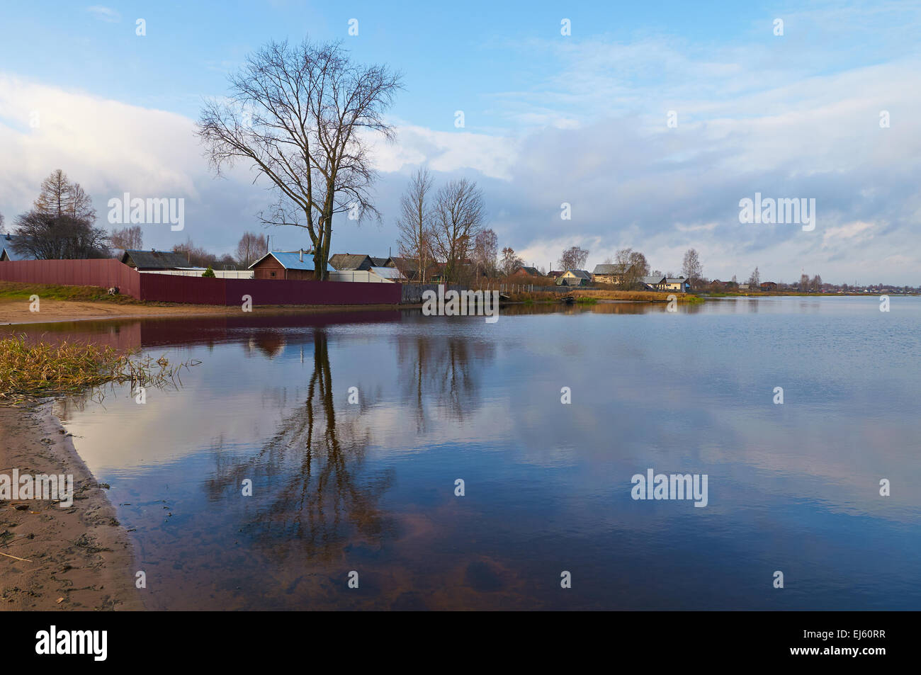 Lake view in October with reflection of the sky Stock Photo - Alamy